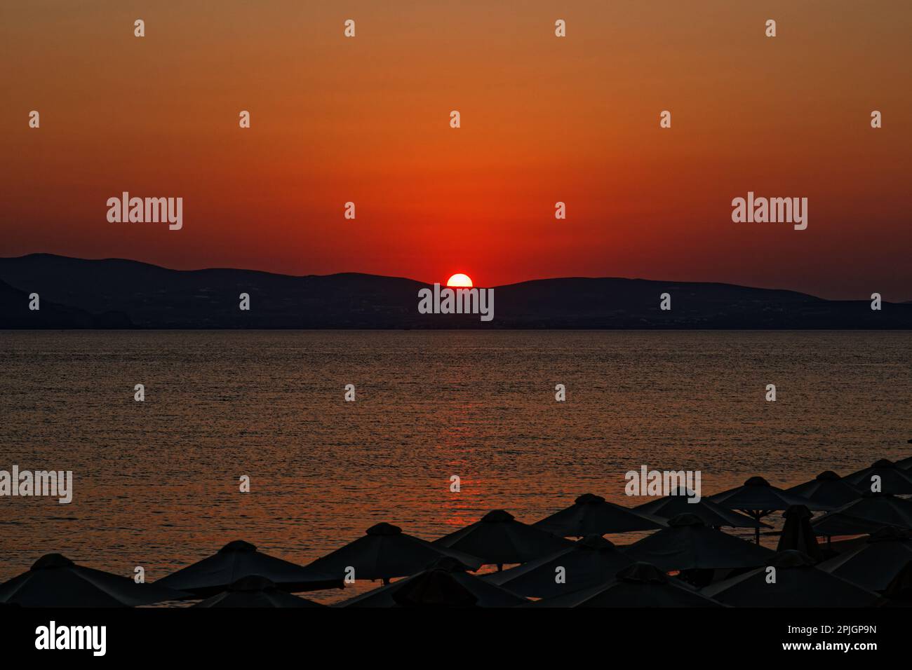 A beautiful summer sunset at Plaka Beach, Naxos, Greece Stock Photo - Alamy