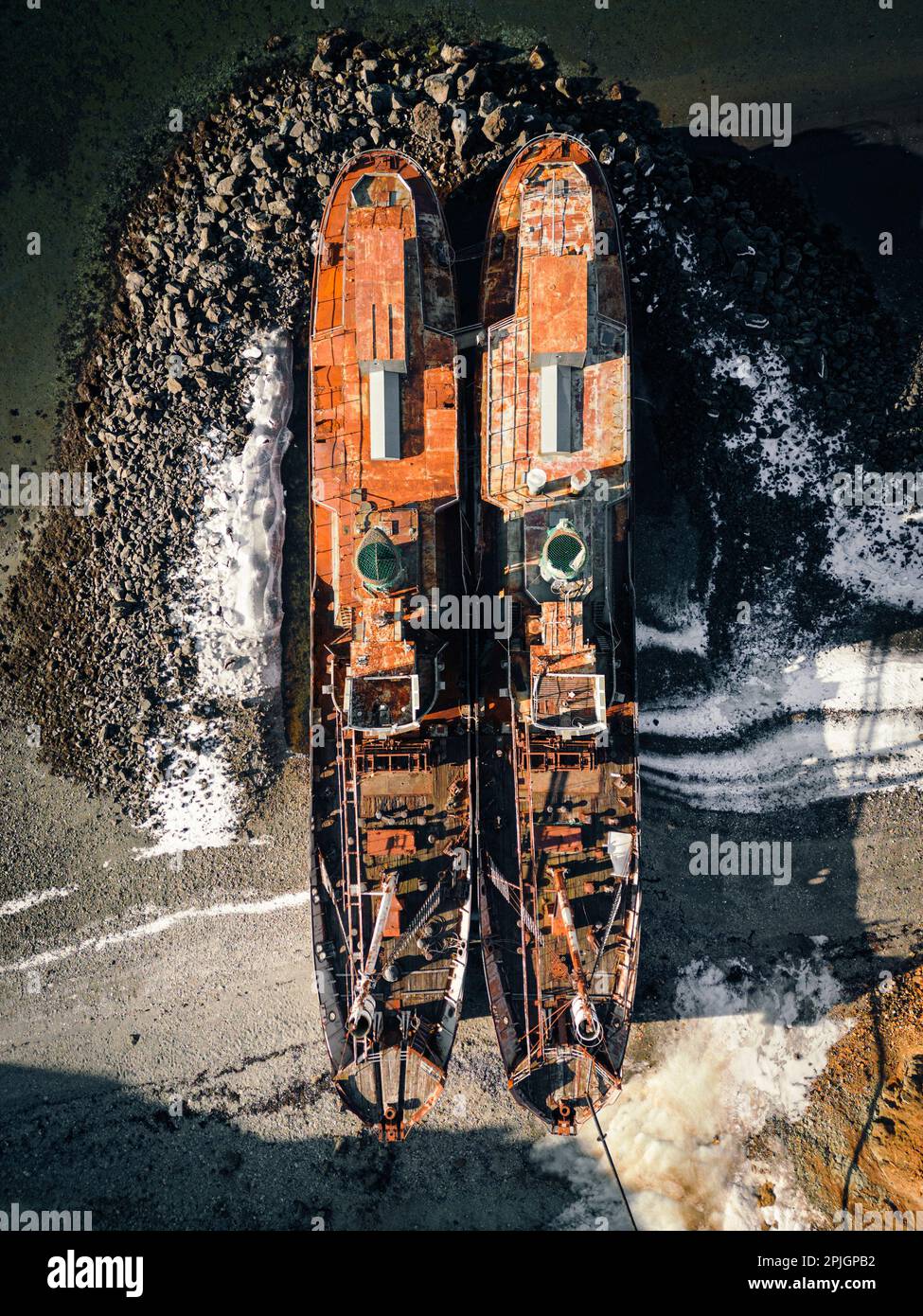 Aerial view of old abandoned whalers Hvalur 6 RE-376 and Hvalur 7 RE ...