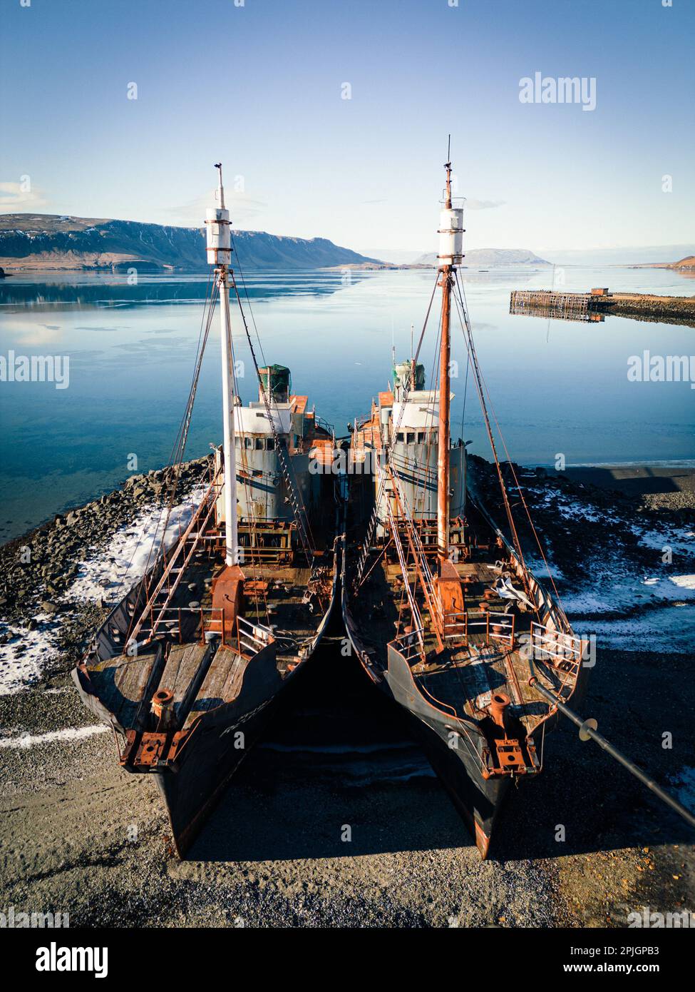 Aerial view of old abandoned whalers Hvalur 6 RE-376 and Hvalur 7 RE ...