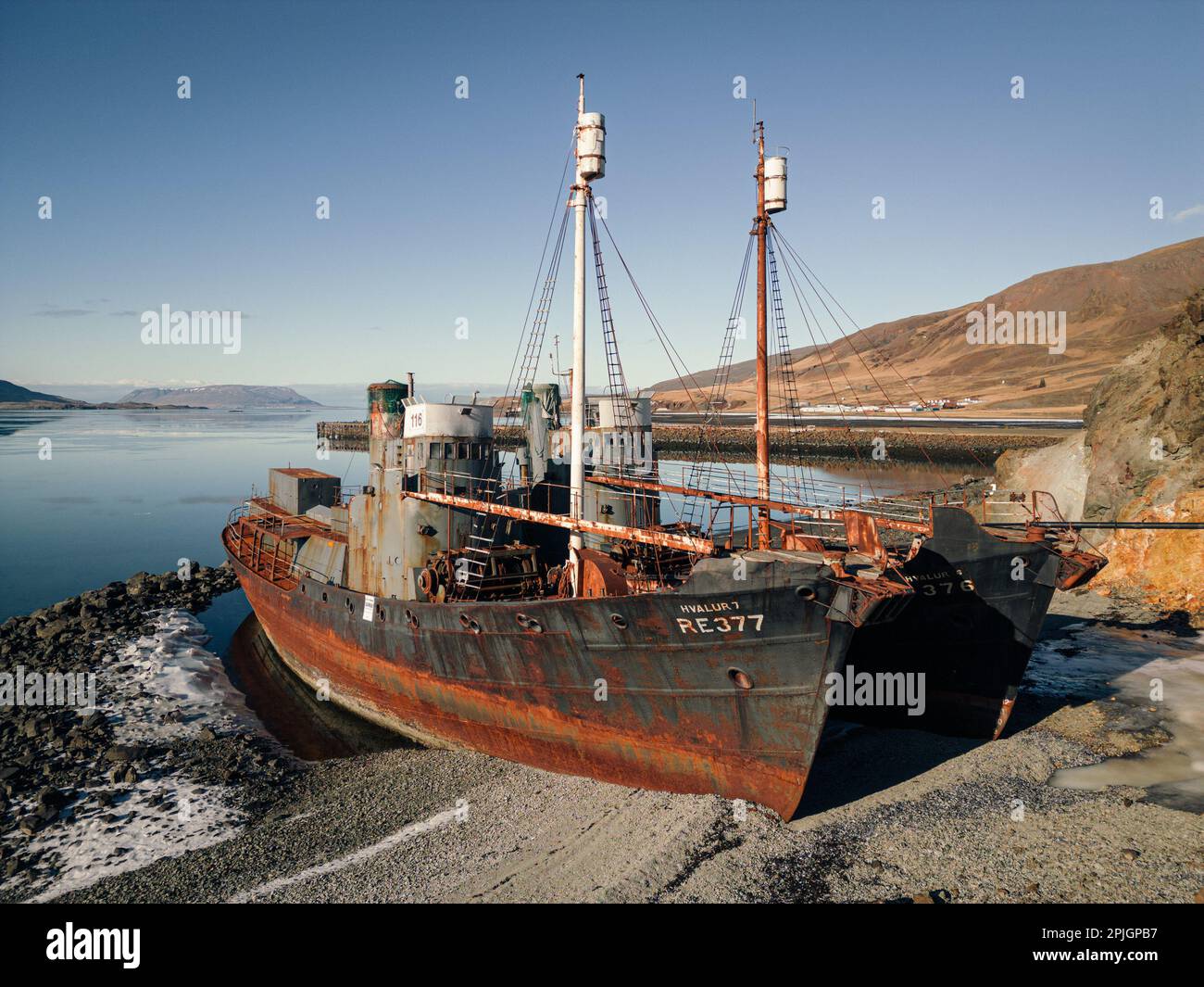 Aerial view of old abandoned whalers Hvalur 6 RE-376 and Hvalur 7 RE ...