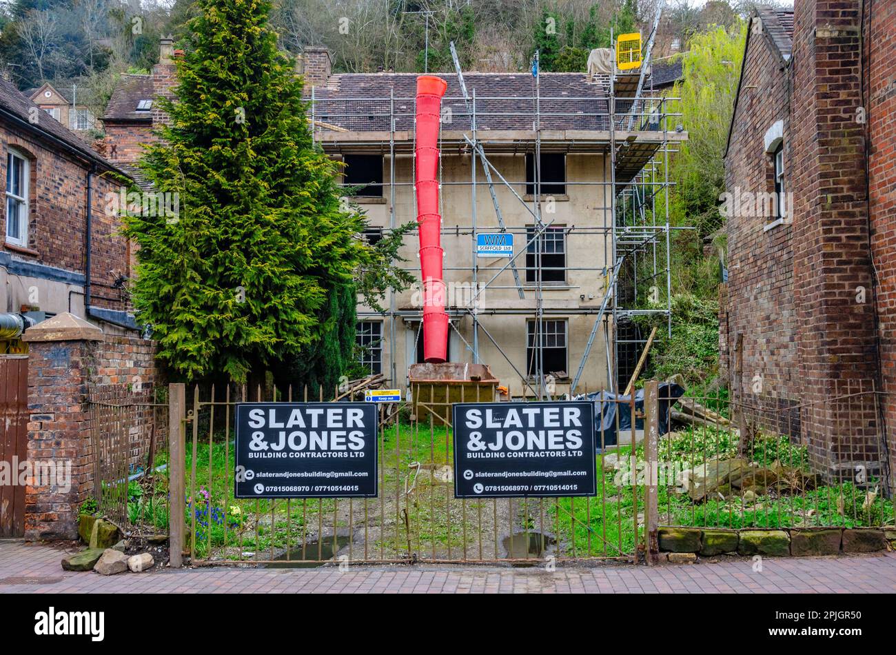 A building on Wharfage in Ironbridge, Shropshire, UK is being renovated ...