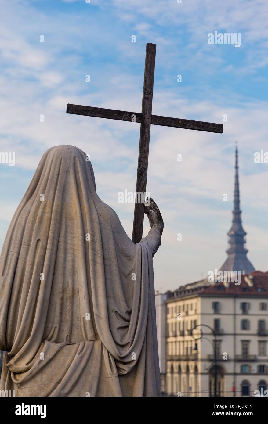 Religion Statue with cross - located in front of Gran Madre Church ...