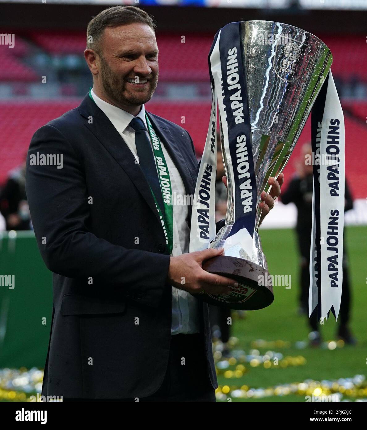 LONDON, ENGLAND - APRIL 02: Bolton manager Ian Evatt with the trophy ...
