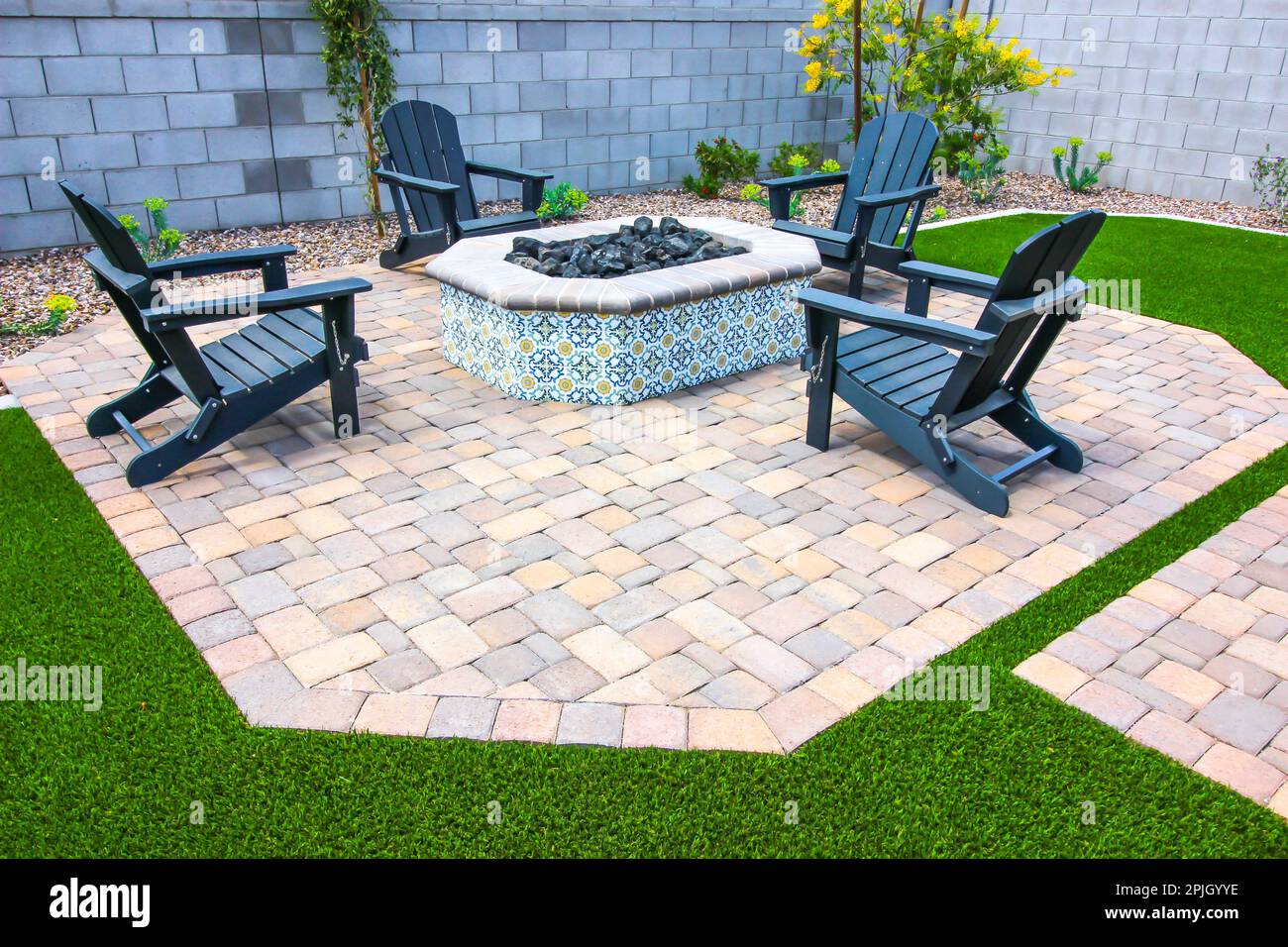 Back Yard Conversation Area With Fire Pit Stock Photo - Alamy