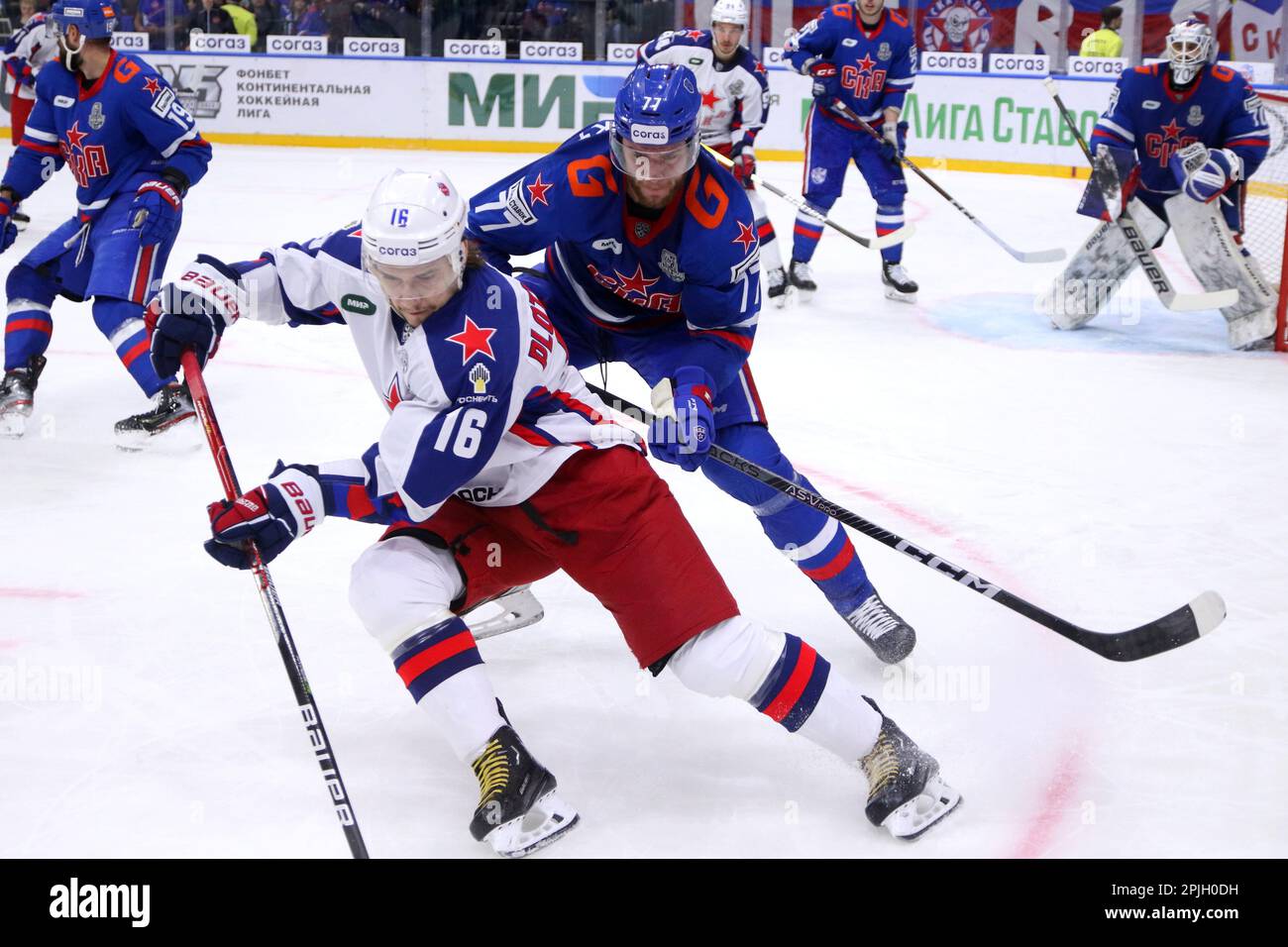 CSKA Hockey Club player, Sergei Plotnikov (No.16) and SKA Hockey Club player, Stepan Falkovsky ...