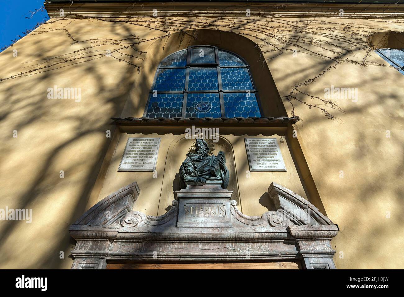 Bust of St. Mark above the entrance portal of the St. Makus Church in ...