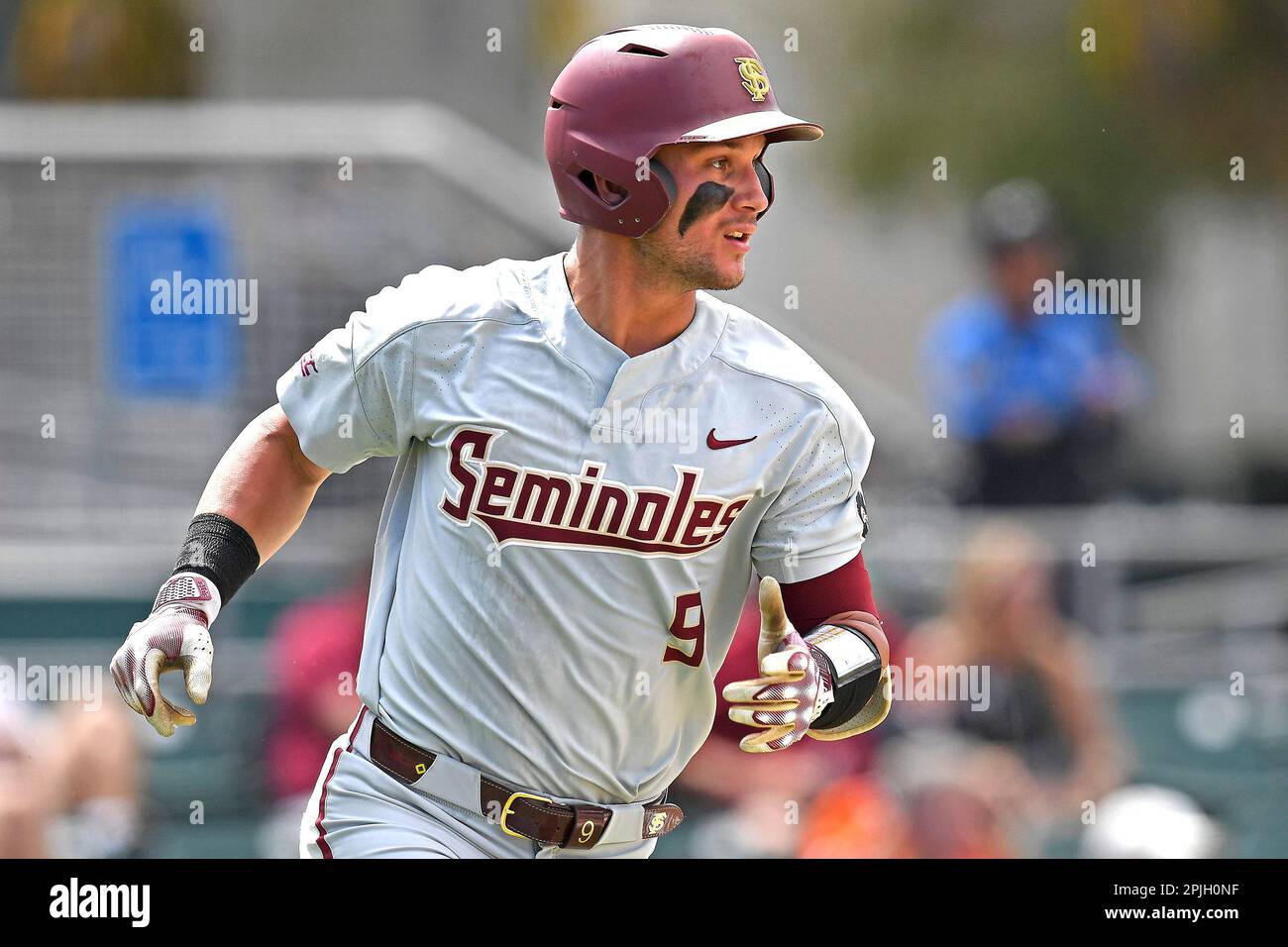CORAL GABLES, FL - APR 01: FSU infielder Treyton Rank (9) runs to first ...