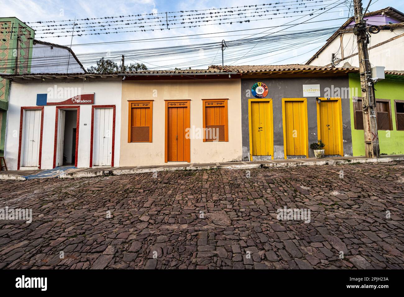 Facades of old colorful colonial houses in the city of Mucuge, Chapada ...