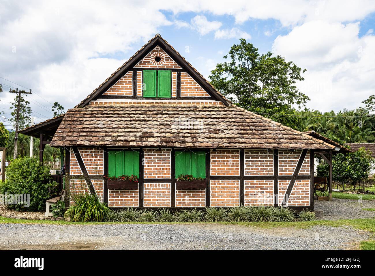Half-timbered house of german immigrants in the countryside of the city ...