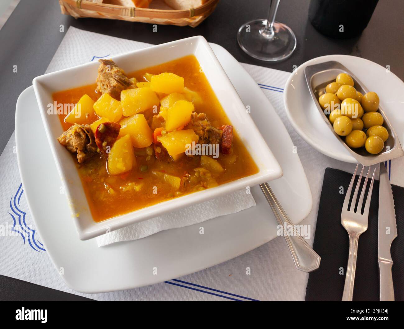 Spanish dish - ribs and chorizo sausage with potatoes Stock Photo - Alamy