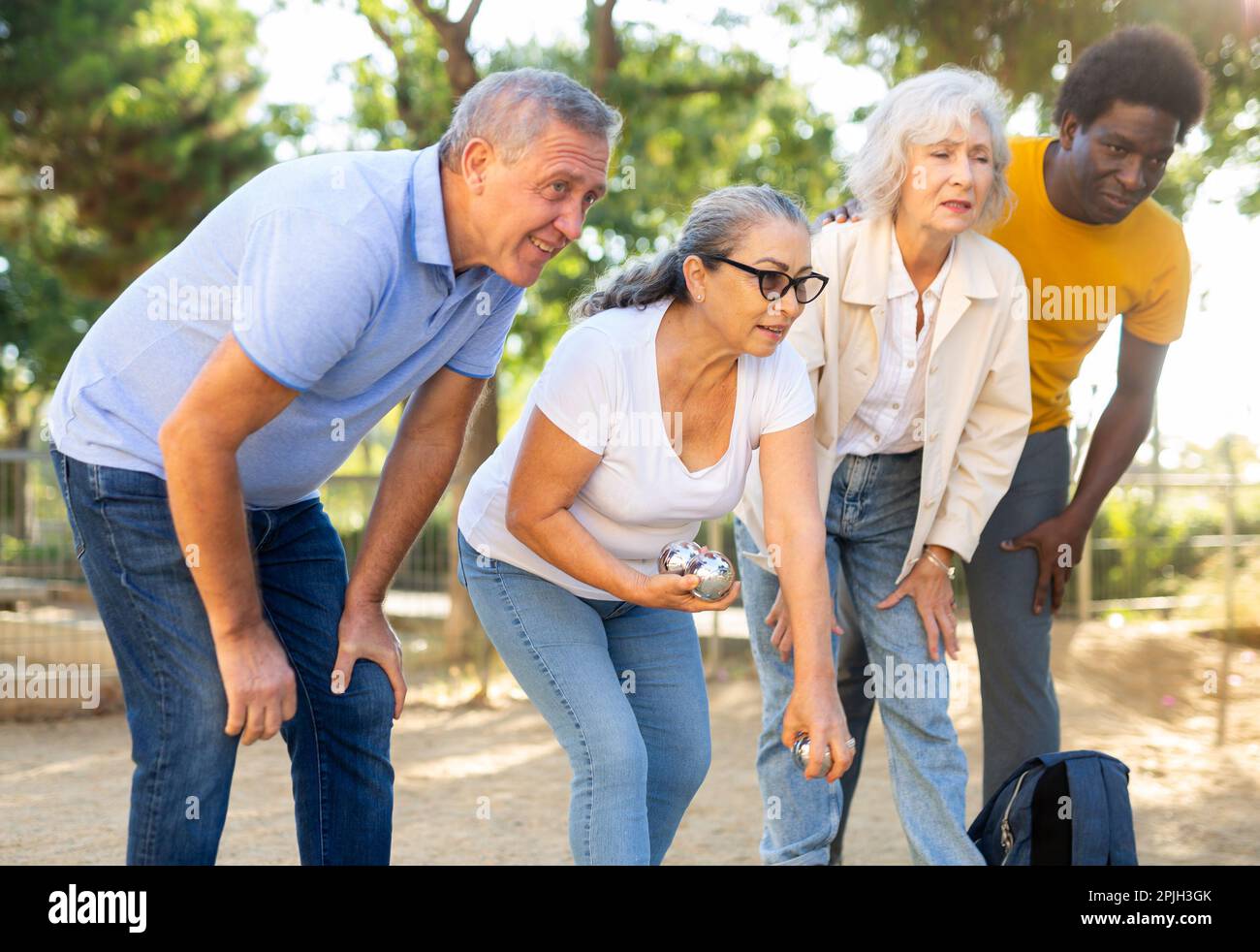 Group friends throwing balls hi-res stock photography and images - Alamy