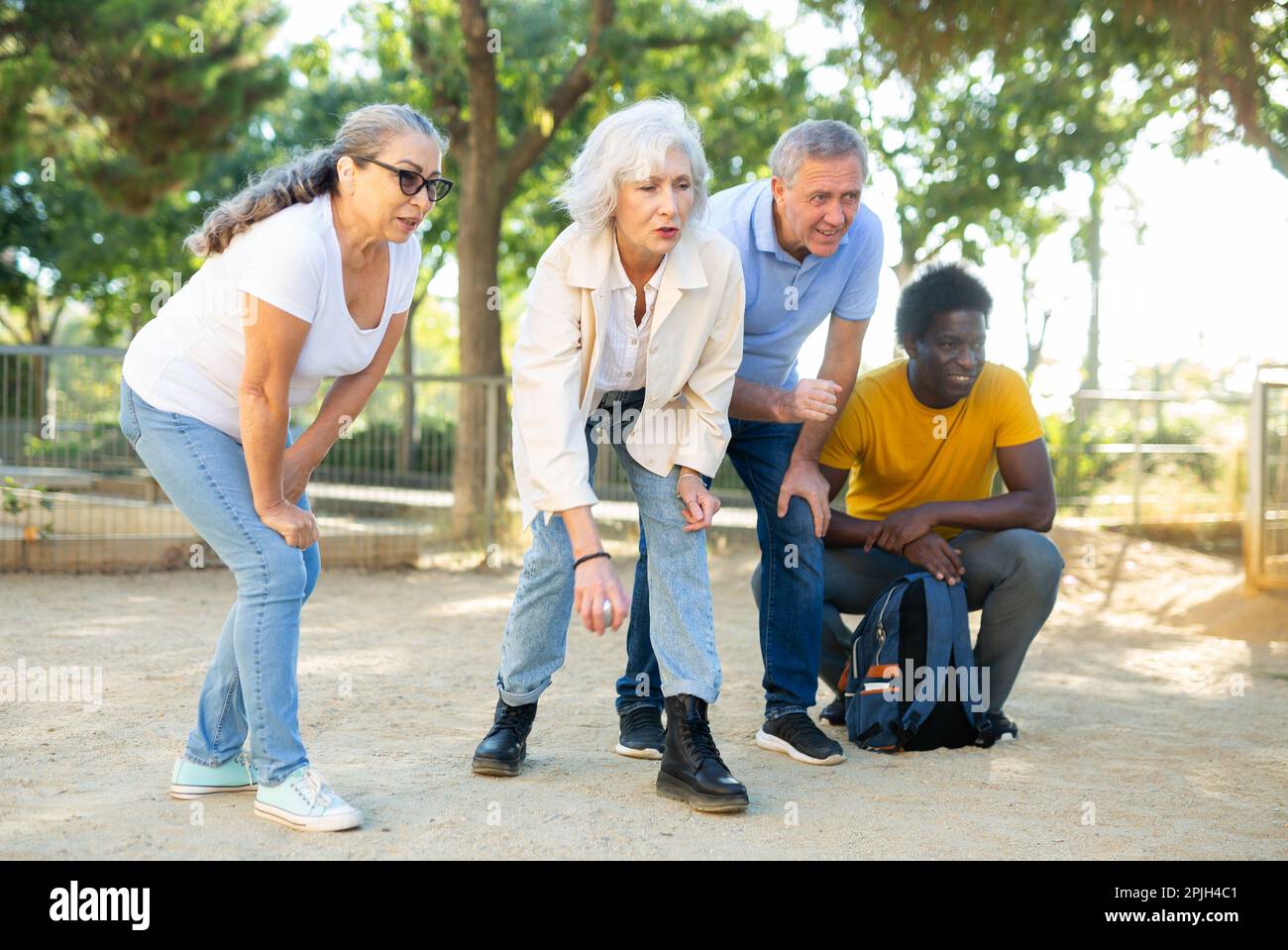 Group friends throwing balls hi-res stock photography and images - Alamy
