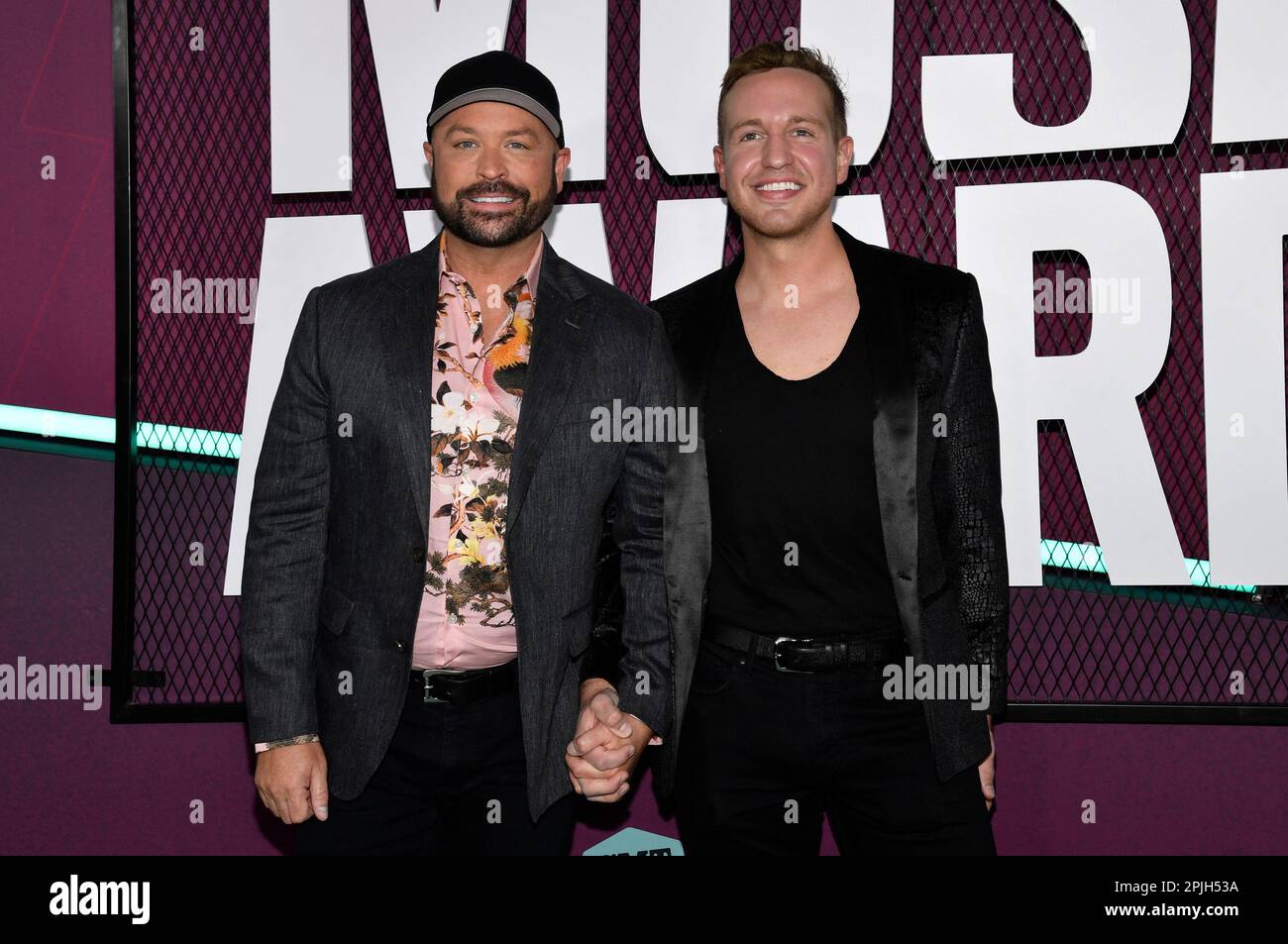 Cody Alan, left, and Trea Smith arrive at the CMT Music Awards on ...