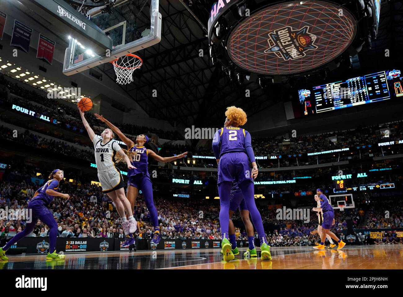 Iowa's Molly Davis shoots past LSU's Angel Reese during the second half ...
