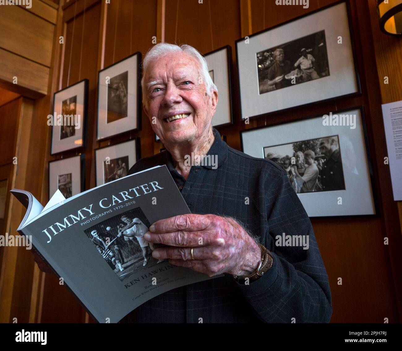 President Jimmy Carter at an exhibition of photojournalist Ken Hawkins ...