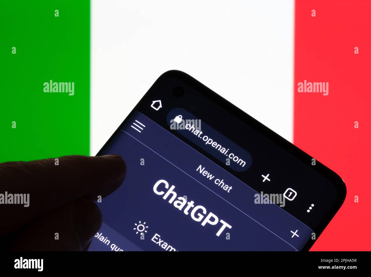 ChatGPT chat bot screen seen on smartphone and flag of Italy on the ...