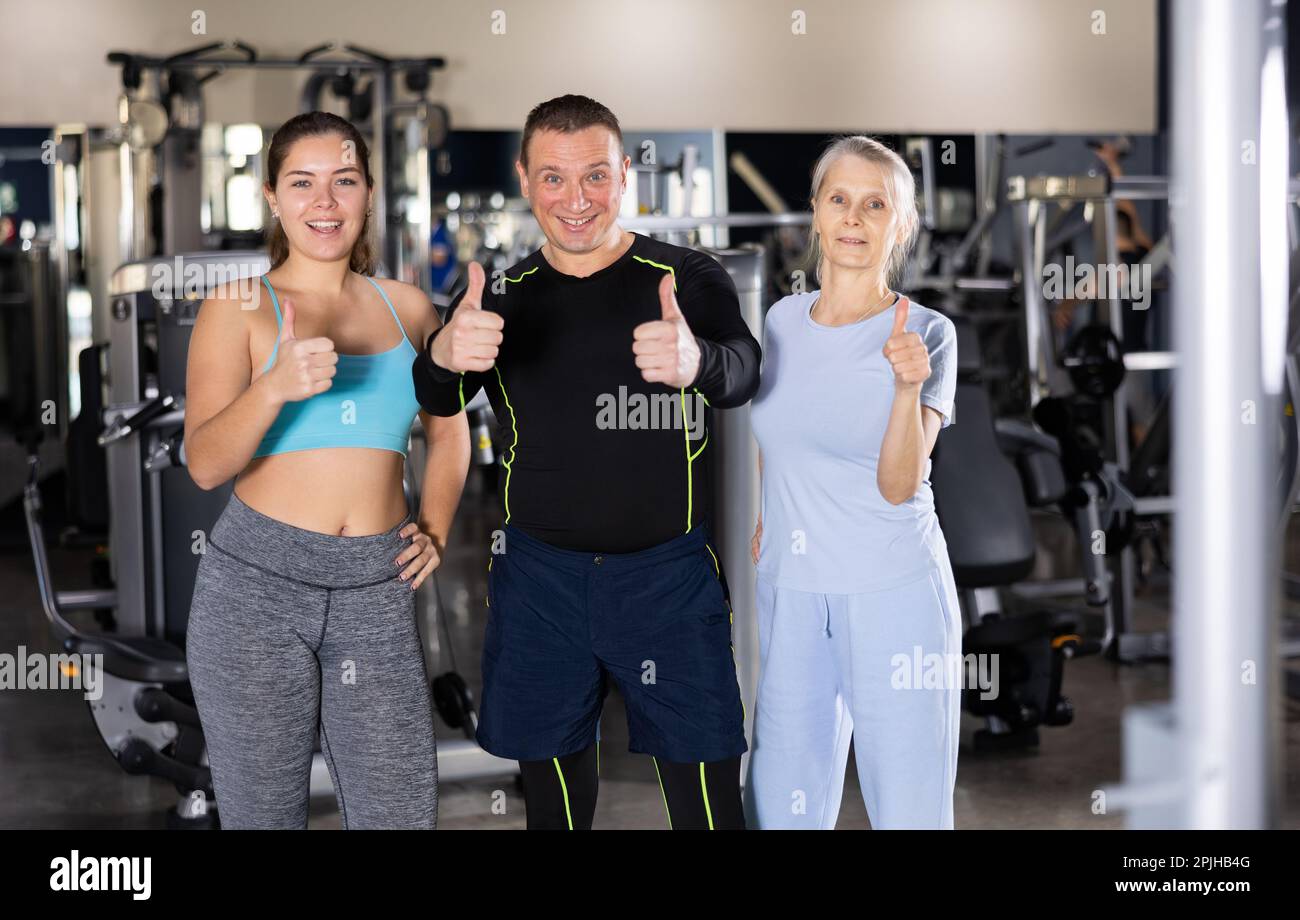 fun party of people of different ages standing in the gym Stock Photo ...