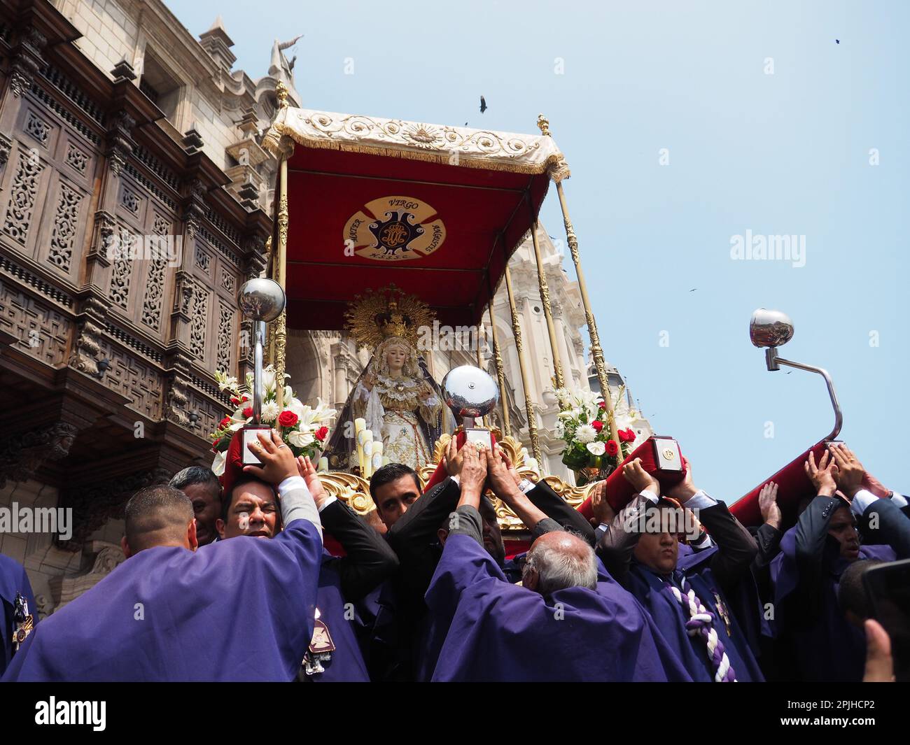 Penitents carrying on an image of Christ on Palm Sunday Procession, as ...