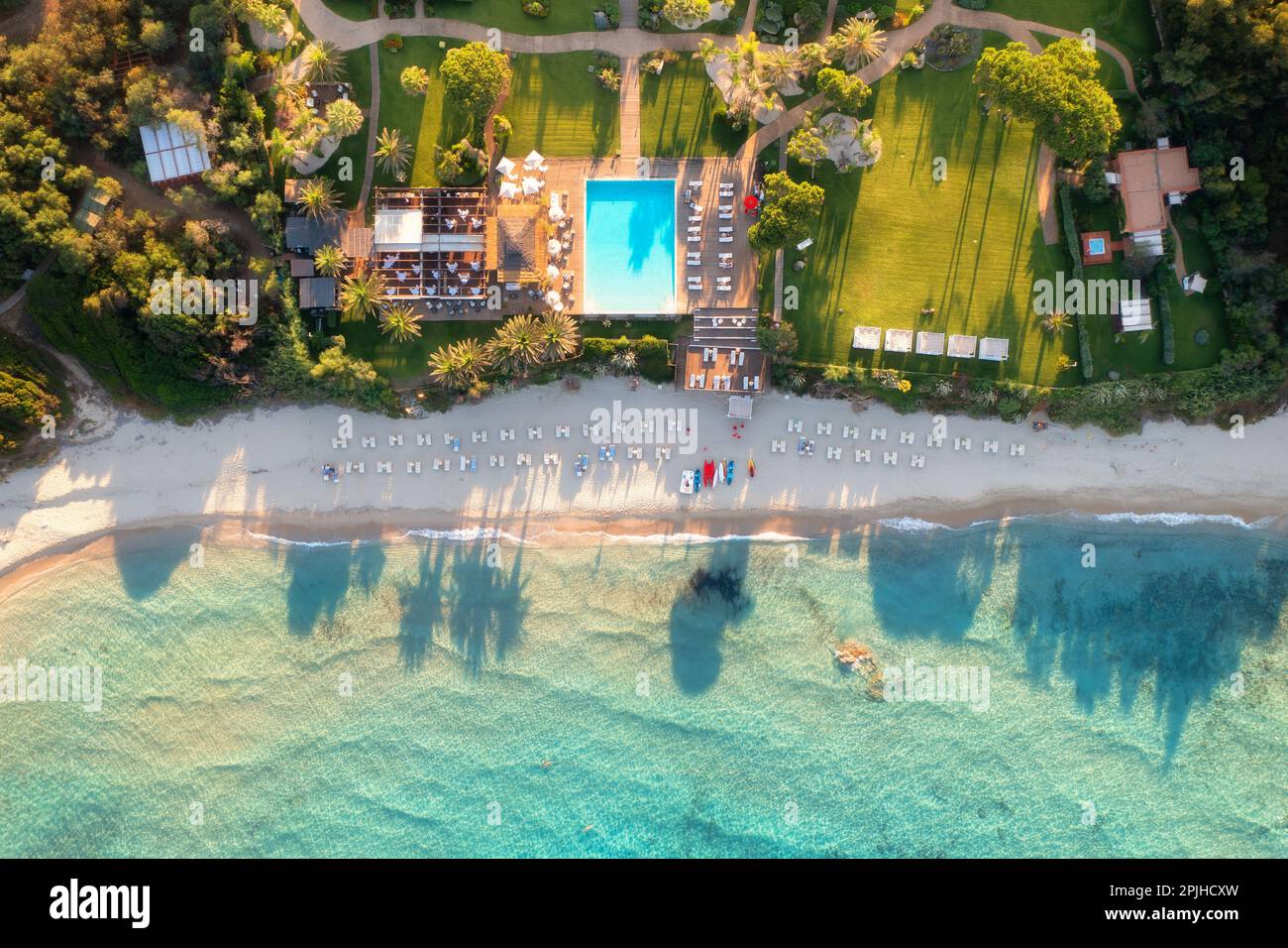Aerial view of empty sandy beach, sea with azure water and waves Stock ...