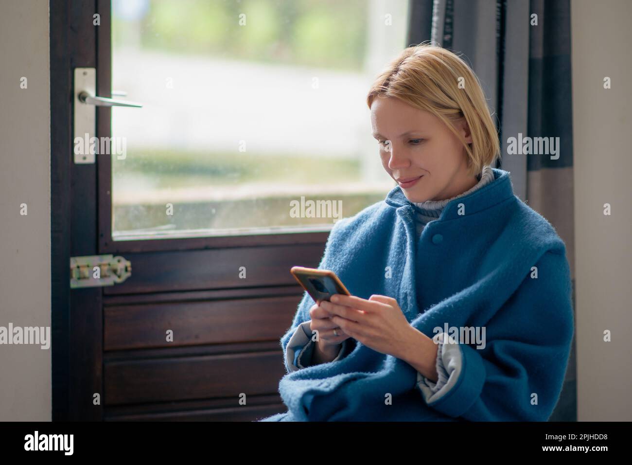 telephone communication, correspondence. A middle-aged woman in her ...