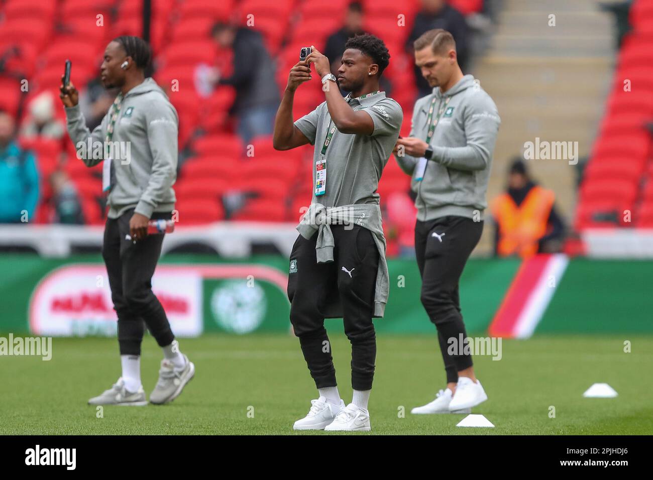Bali Mumba #17 of Plymouth Argyle arrives ahead of the Papa John's ...