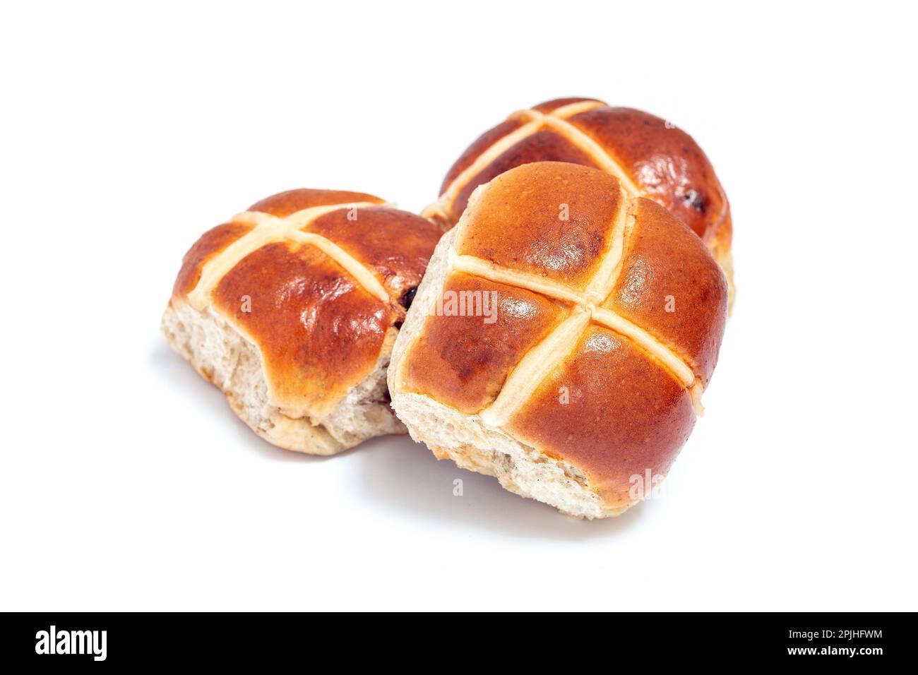 Freshly baked hot cross buns isolated on a white background ...