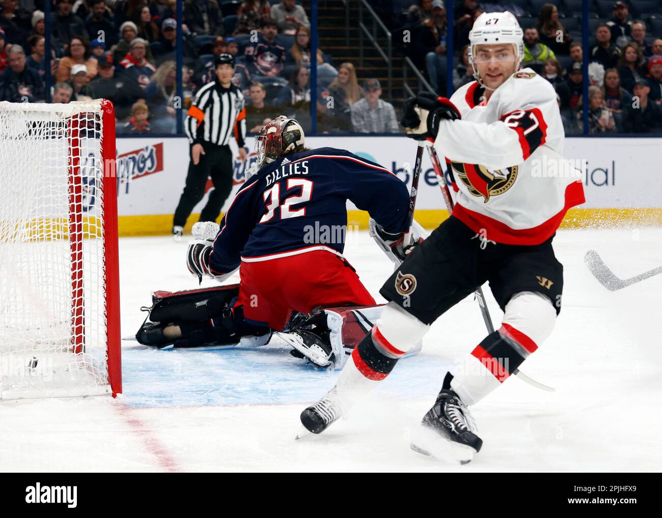 Ottawa Senators forward Dylan Gambrell, right, scores past Columbus ...