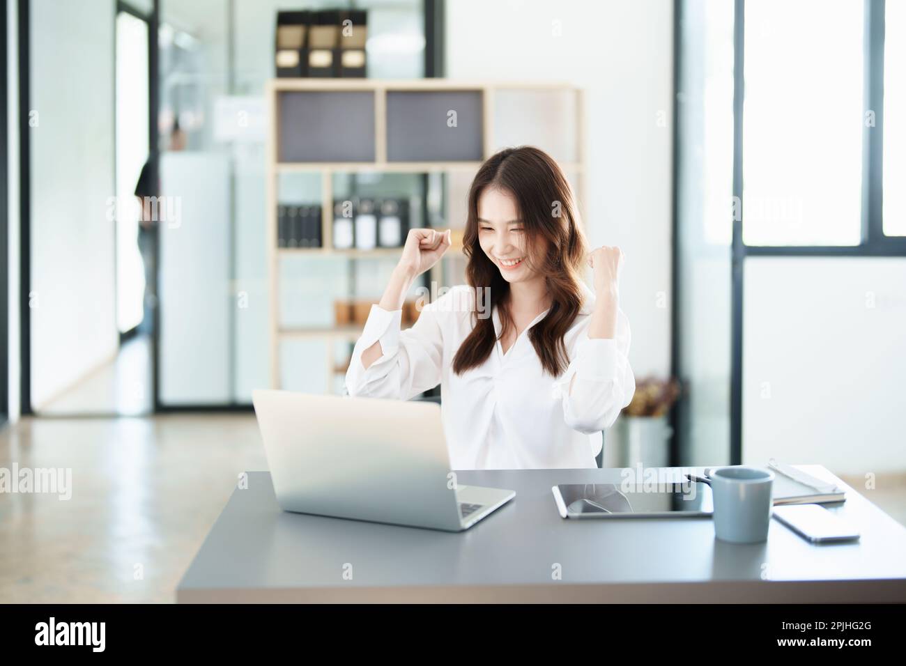 Portrait of a woman business owner showing a happy smiling face as he ...