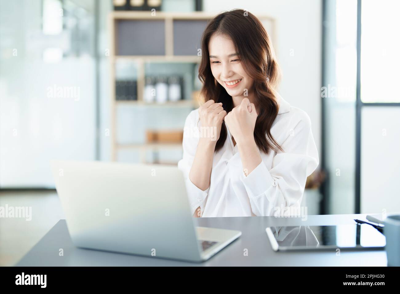 Portrait of a woman business owner showing a happy smiling face as he ...