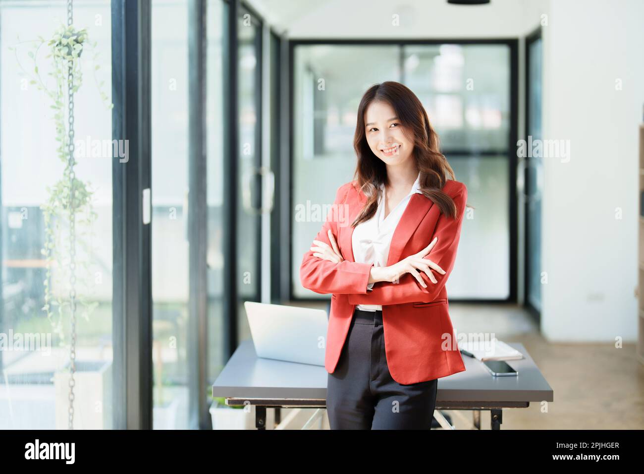 Portrait of a woman business owner showing a happy smiling face as he ...