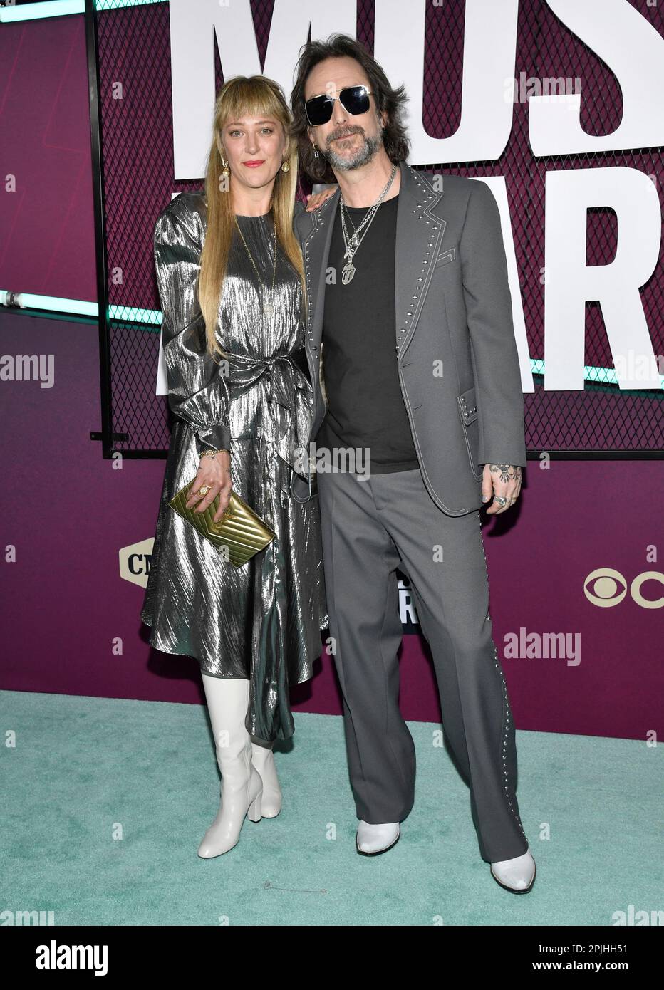 Chris Robinson, right, and Camille Johnson arrive at the CMT Music Awards on Sunday, April 2 ...