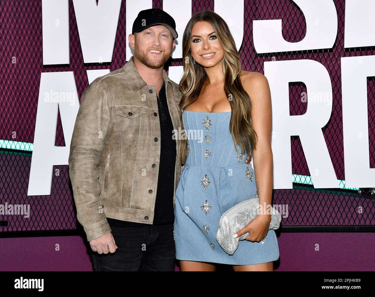 Cole Swindell, left, and Courtney Little arrive at the CMT Music Awards ...