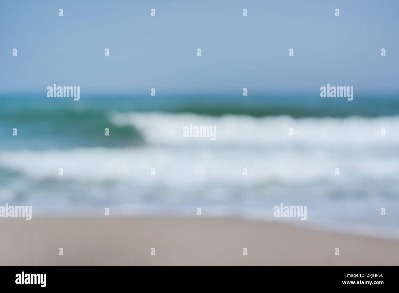 Blurred view of sea waves and sandy beach. Summer vacation Stock Photo ...