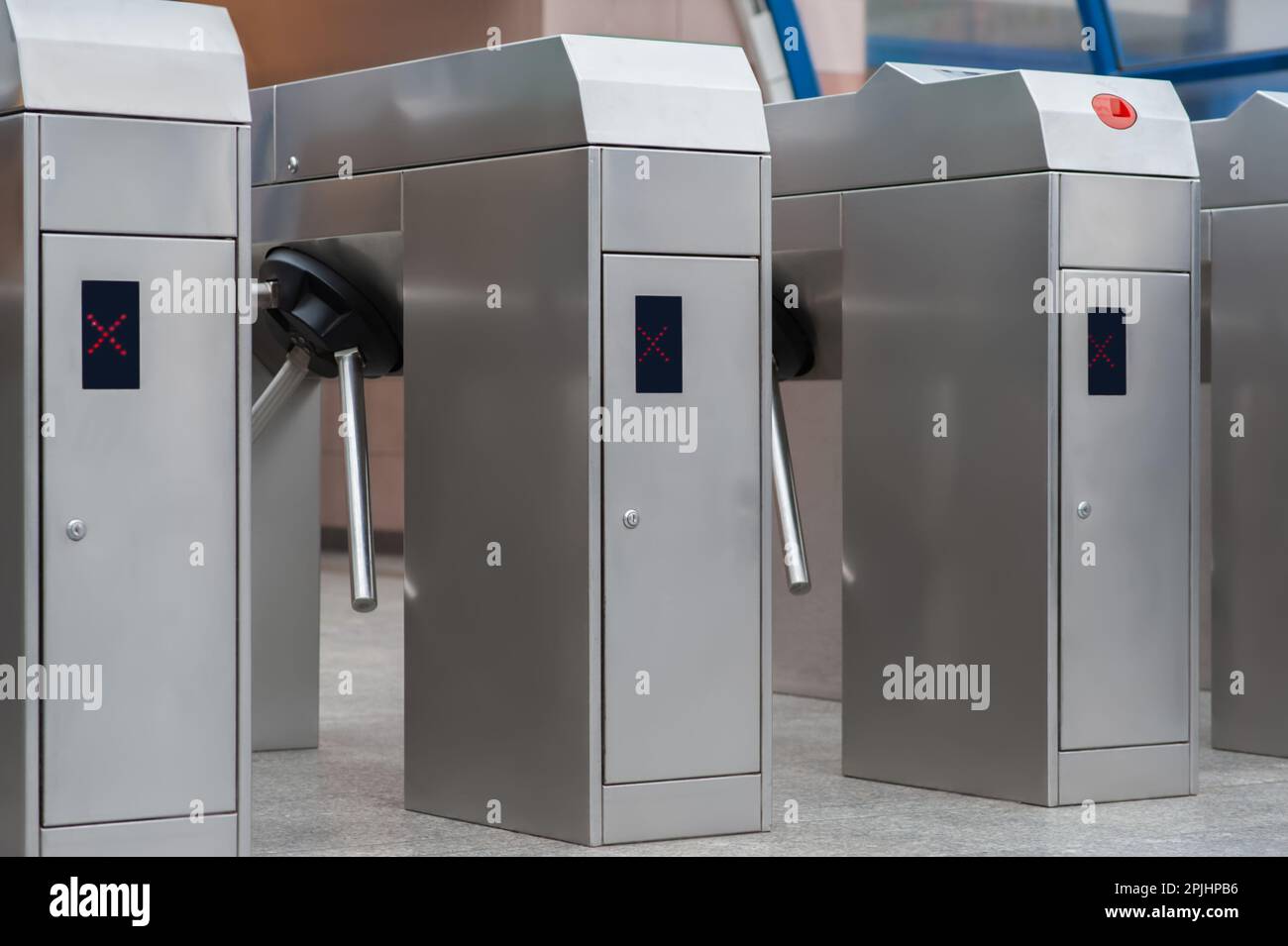 Many modern turnstiles, closeup view. Fare collection system Stock ...
