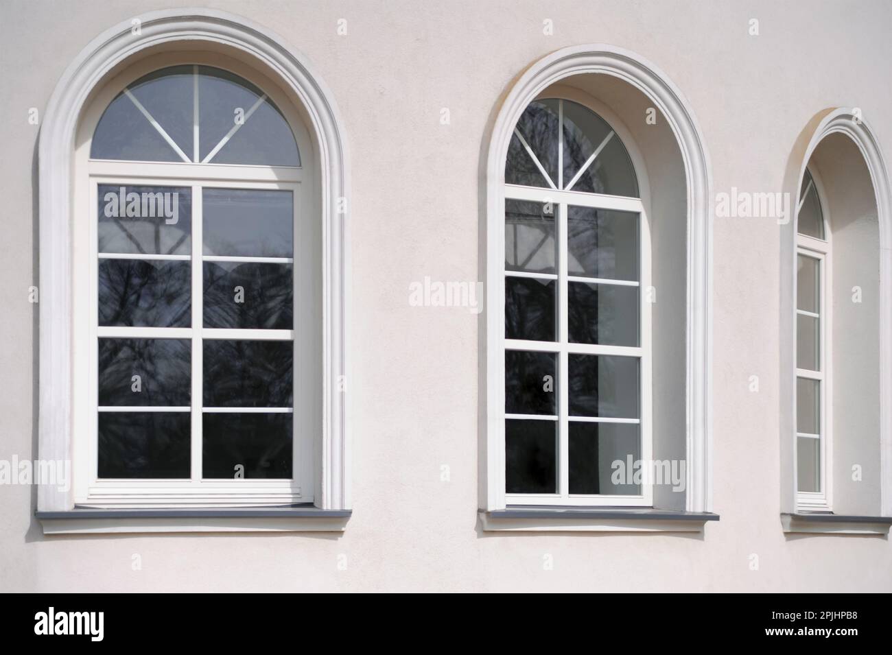 Beautiful arched windows in building, view from outdoors Stock Photo ...