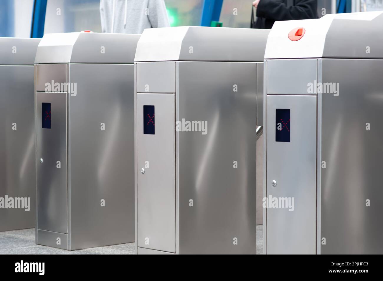 Many modern turnstiles, closeup view. Fare collection system Stock ...