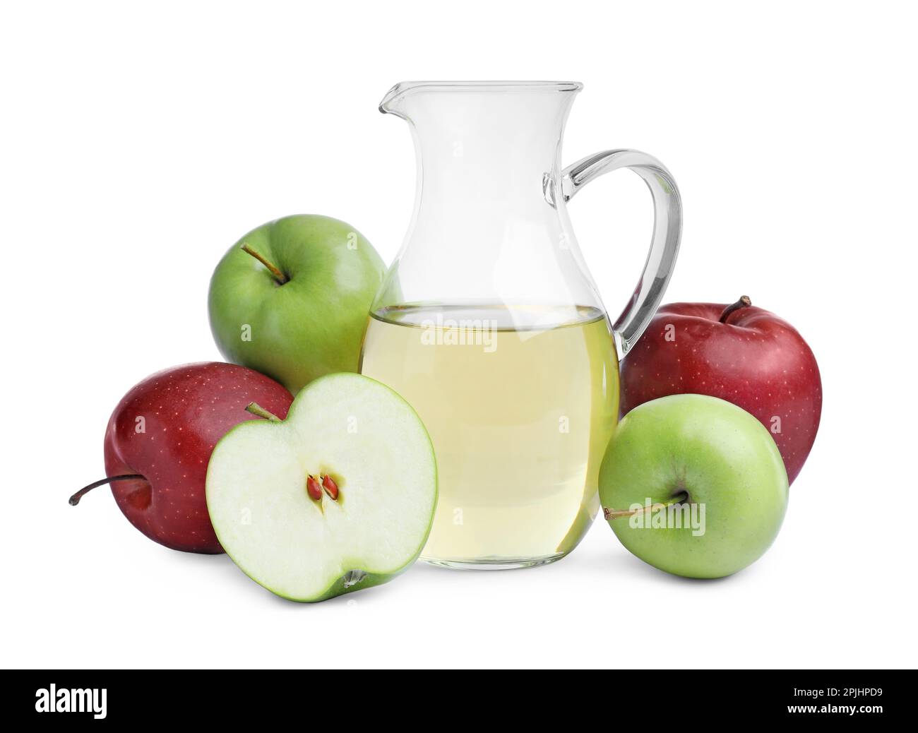 Different ripe apples and jug of juice on white background Stock Photo ...