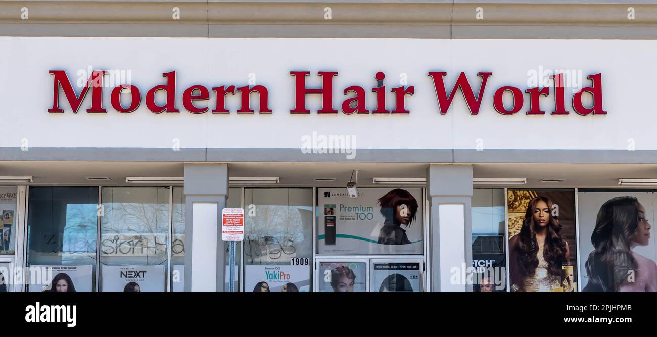 The Modern Hair World sign above the front door of the business in ...