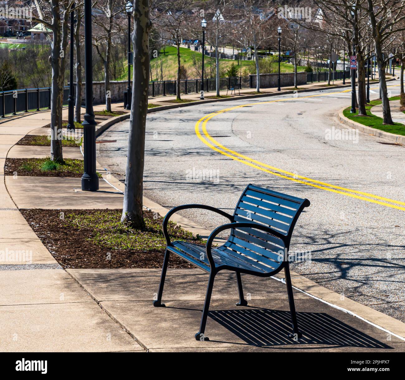 A metal park bench along Parkview Avenue in the Summerset neighborhood ...