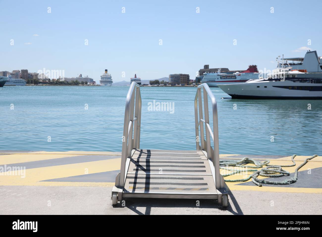 Modern ship gangway on pier in seaport Stock Photo - Alamy