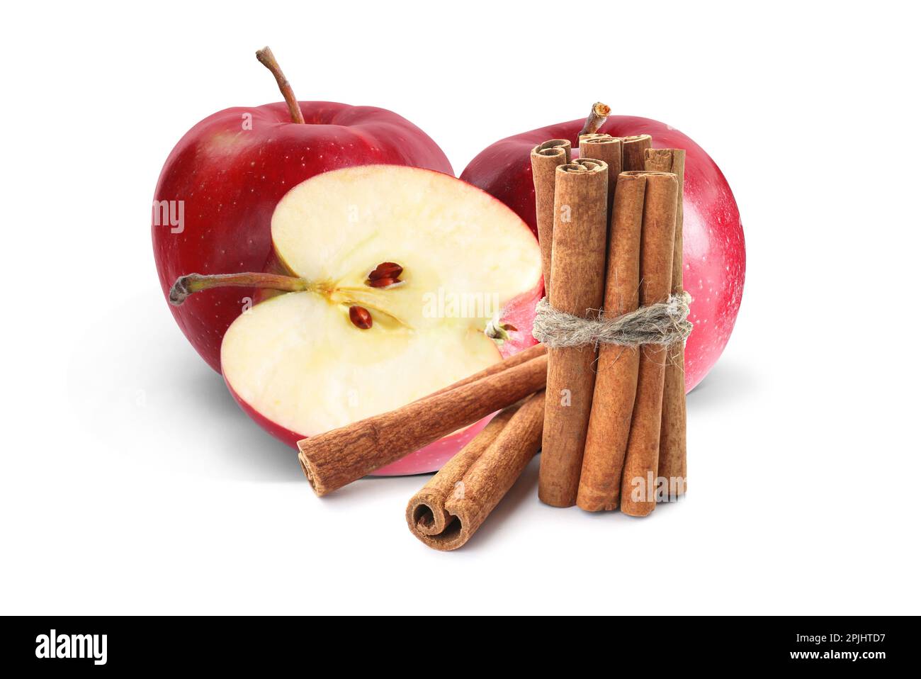 Fresh ripe apples and aromatic cinnamon sticks on white background ...