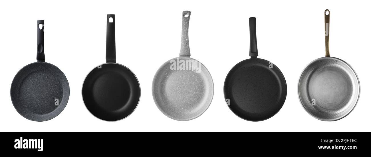 Set with different frying pans on white background, top view. Banner ...