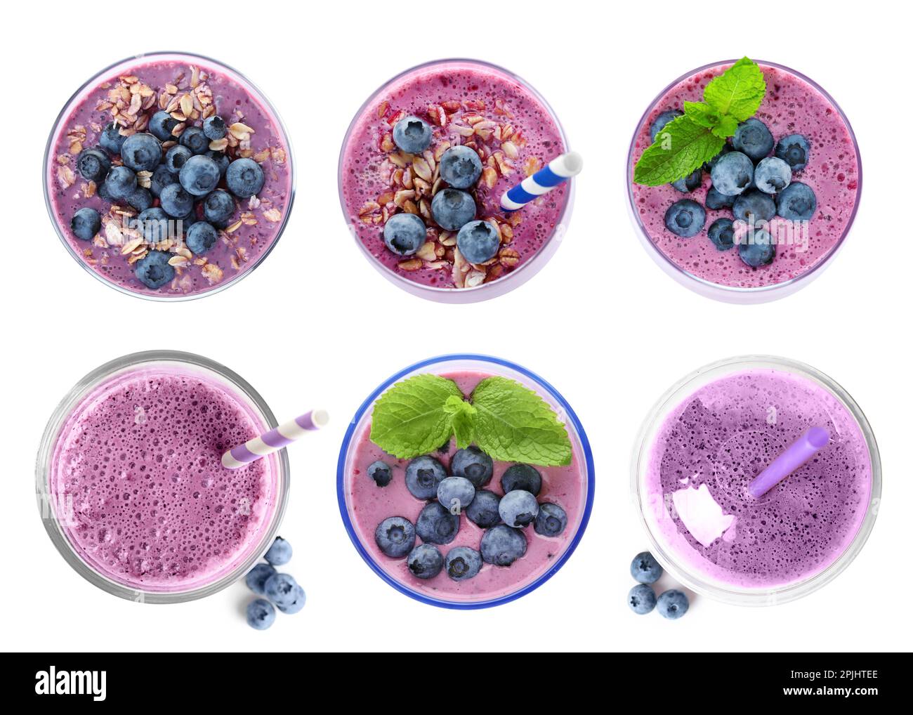 Set with delicious blueberry smoothies on white background, top view ...