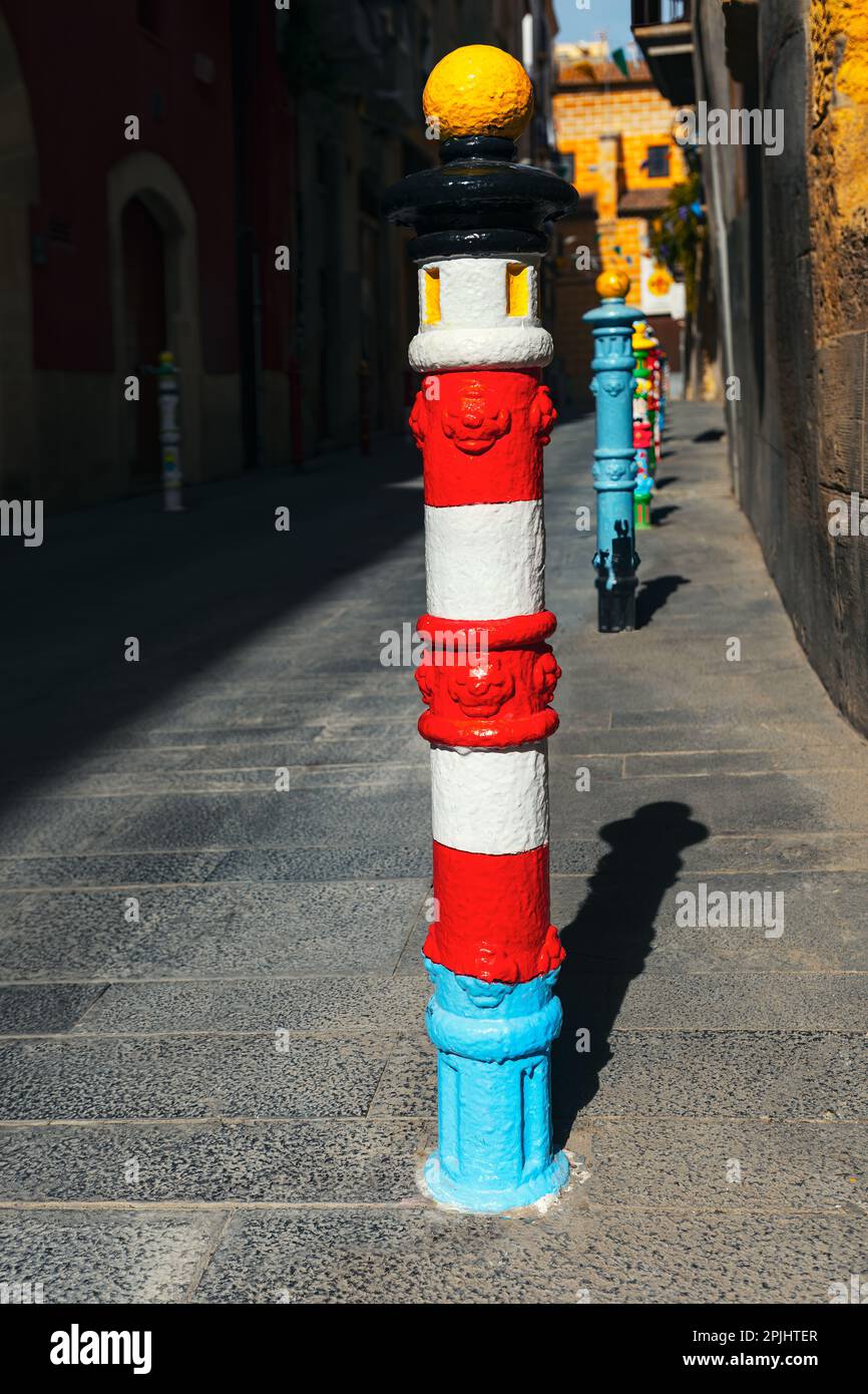 Colorful pillars at pedestrian street . Decorative roadside pillars in ...