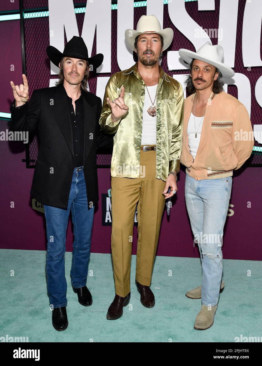 Jess Carson, from left, Mark Wystrach and Cameron Duddy of Midland arrive at the CMT Music ...