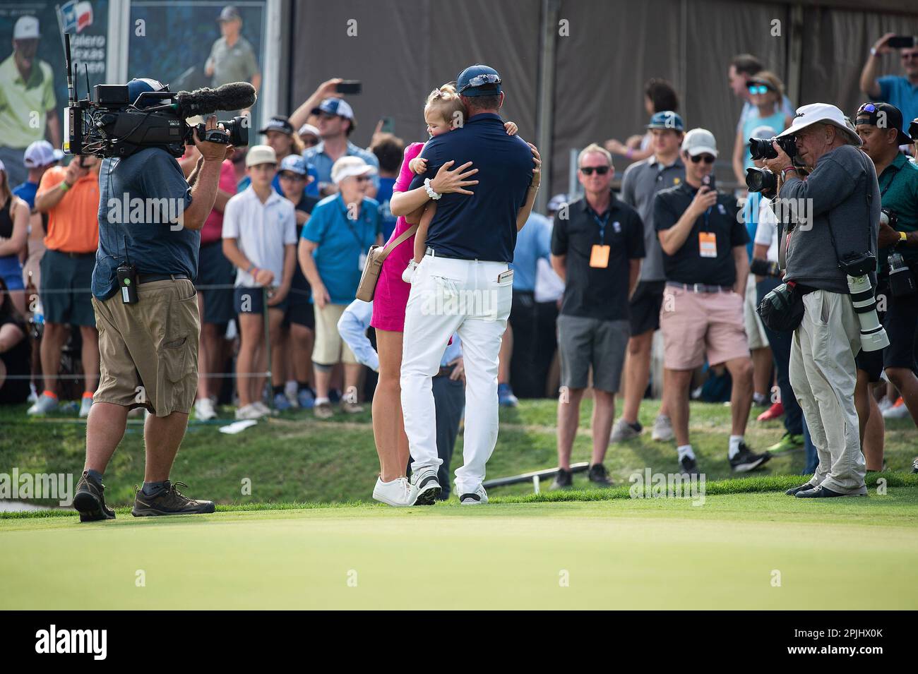 April 02, 2023: Corey Conners celebrates with his family after winning ...