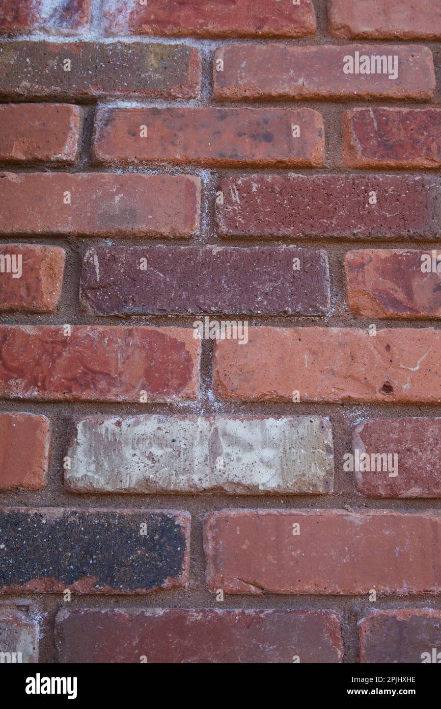 Brick wall with color variation, including red and brown. Textured ...