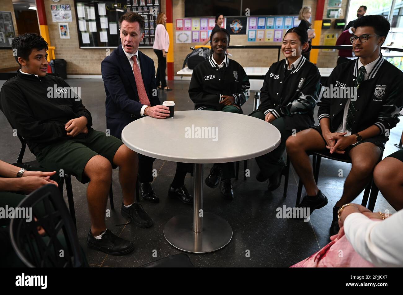 New South Wales Premier Chris Minns speaks to students during a visit ...