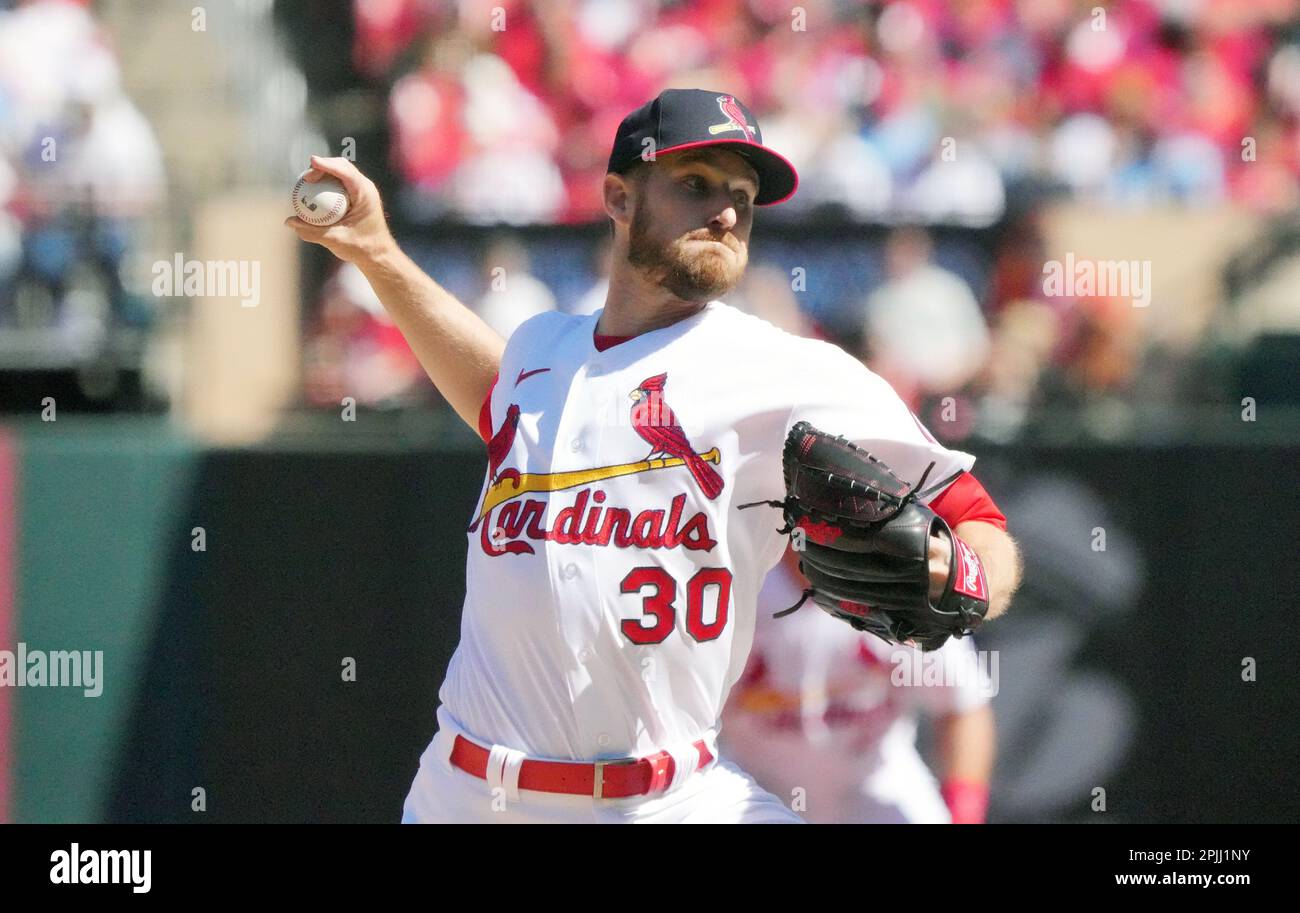 St. Louis Cardinals pitcher Chris Stratton delivers a pitch to the ...