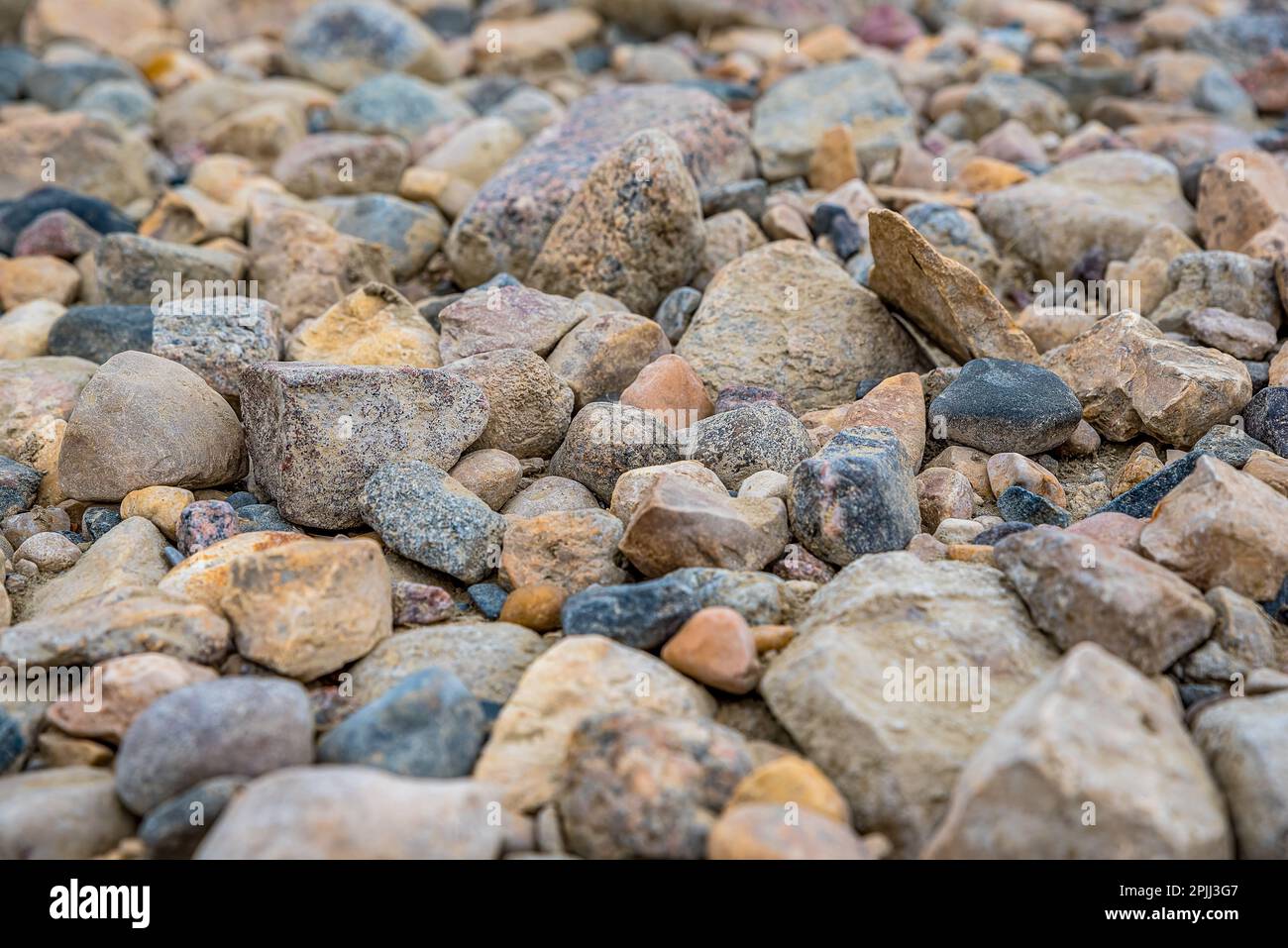 Closeup of colorful stones on a beach in Saskatchewan at the ...